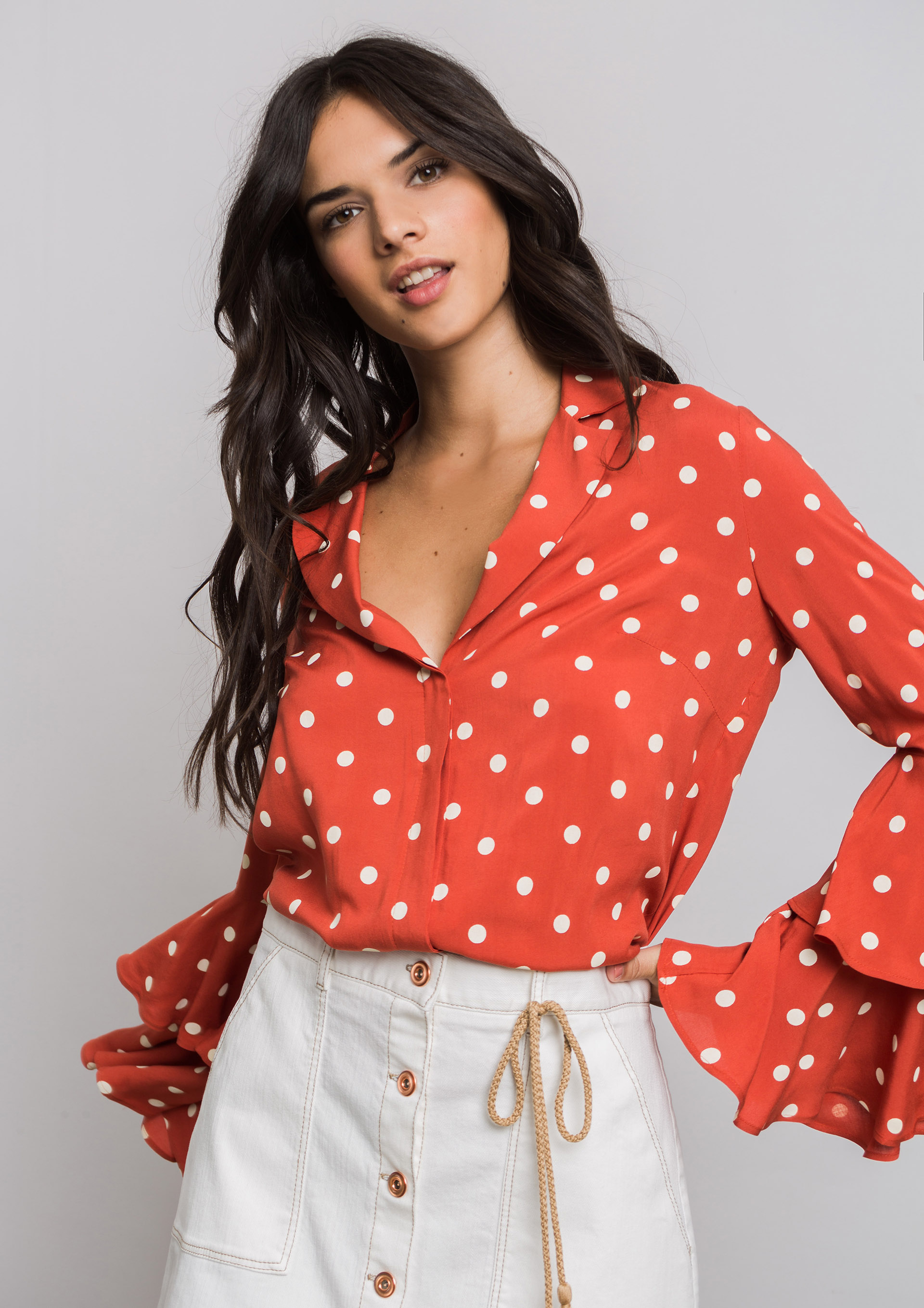 Brick red polka dot blouse with flounce sleeves